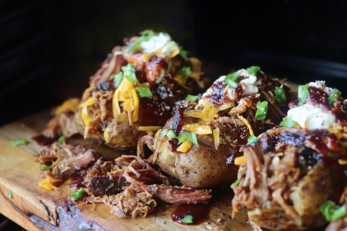 Smoked & Sauced Pulled Pork Loaded Baked Potatoes | Grill Masters Club